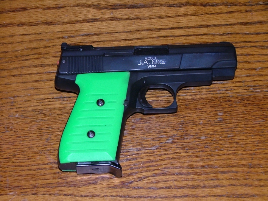 Jimenez Ja9 With Custom Grips And Blackhawk Holster For Sale at ...