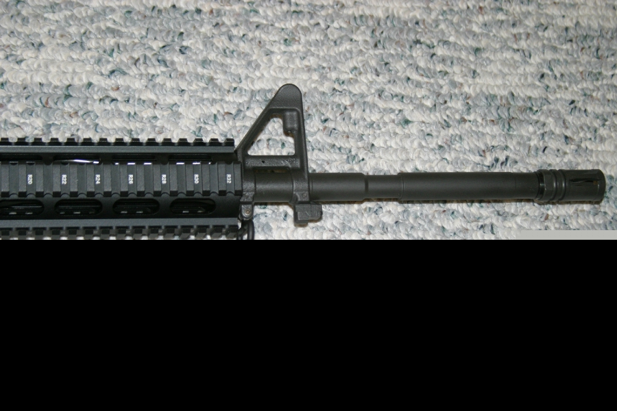 Bushmaster Ar15/M4, Chrome Lined Bbl, Quad Rail For Sale at GunAuction ...