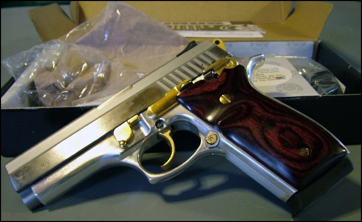 Taurus International Mfg. Co. Taurus Pt945 .45acp S/S Gold Rosewood For ...