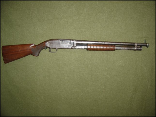 Winchester US. WWII Winchester model 12 riot gun-12 ga.